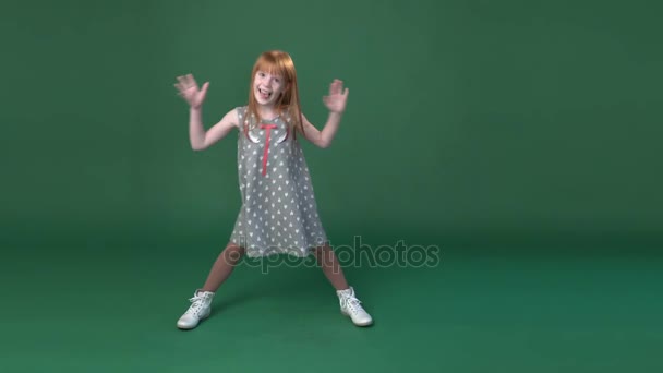 Cute little ginger girl dancing and fooling around — Stock Video ...