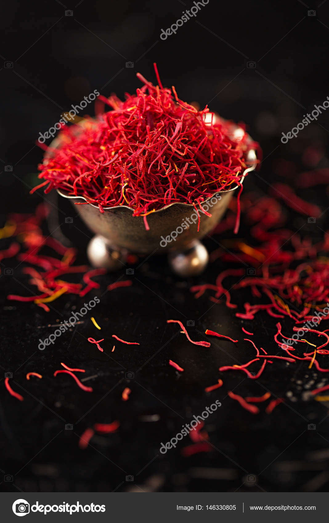 Saffron spice threads in vintage bowl Stock Photo by ©lvenks 146330805