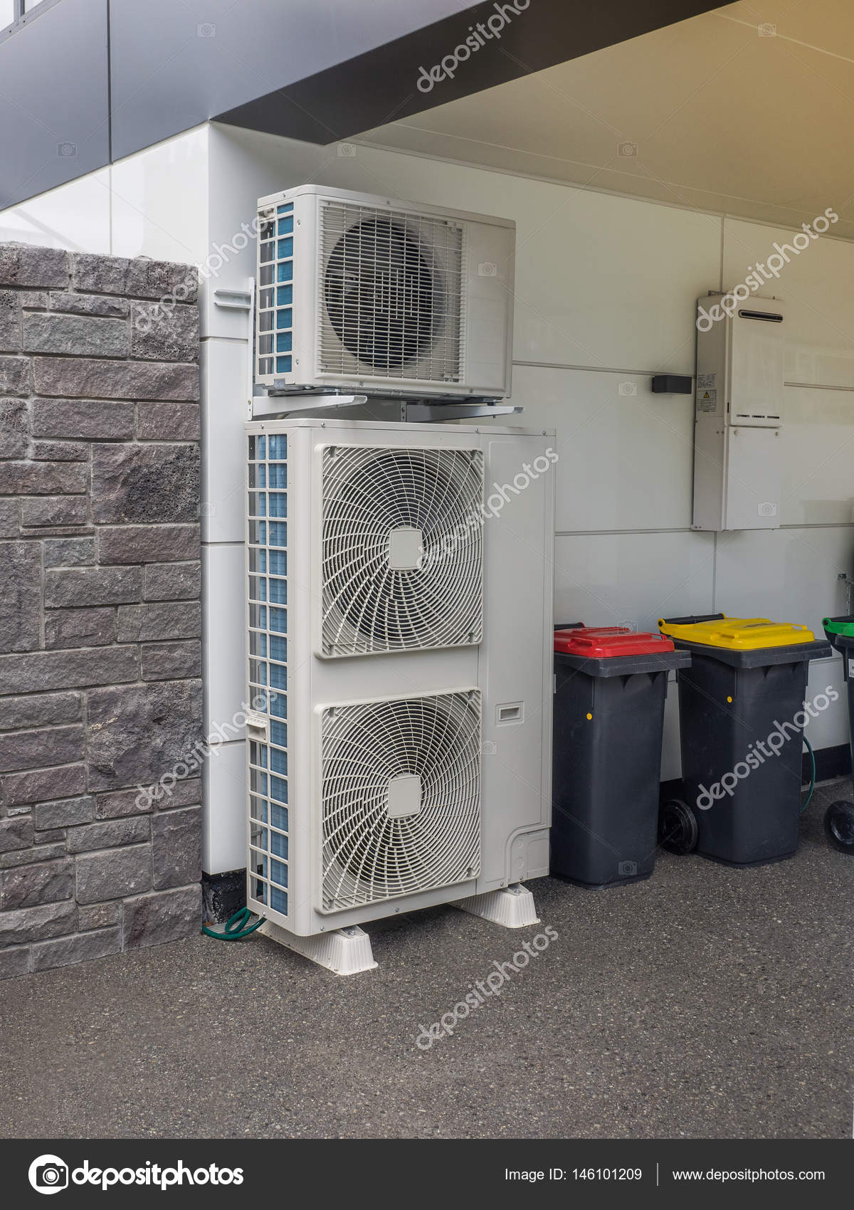 Air conditioning and heating unit for a residential house Stock Photo ...