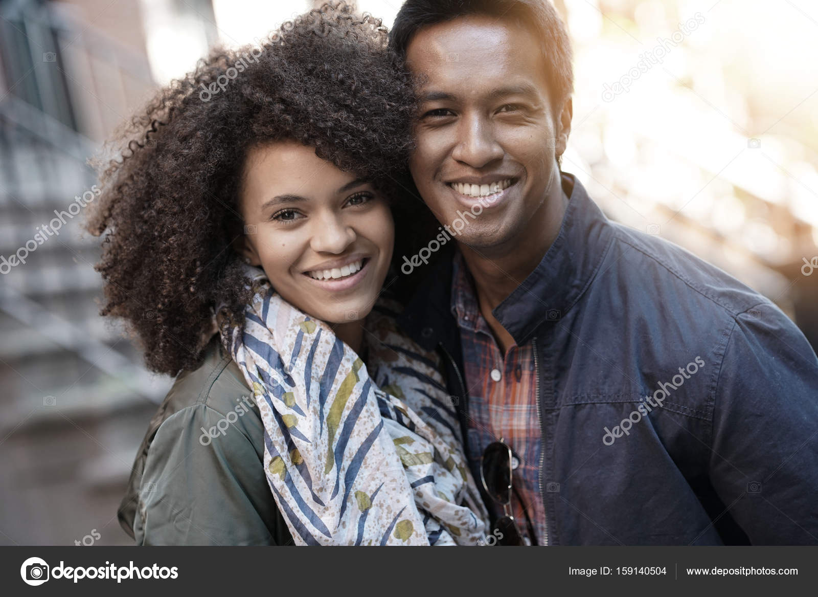 Mixed-race couple enjoying journey Stock Photo by ©Goodluz 159140504