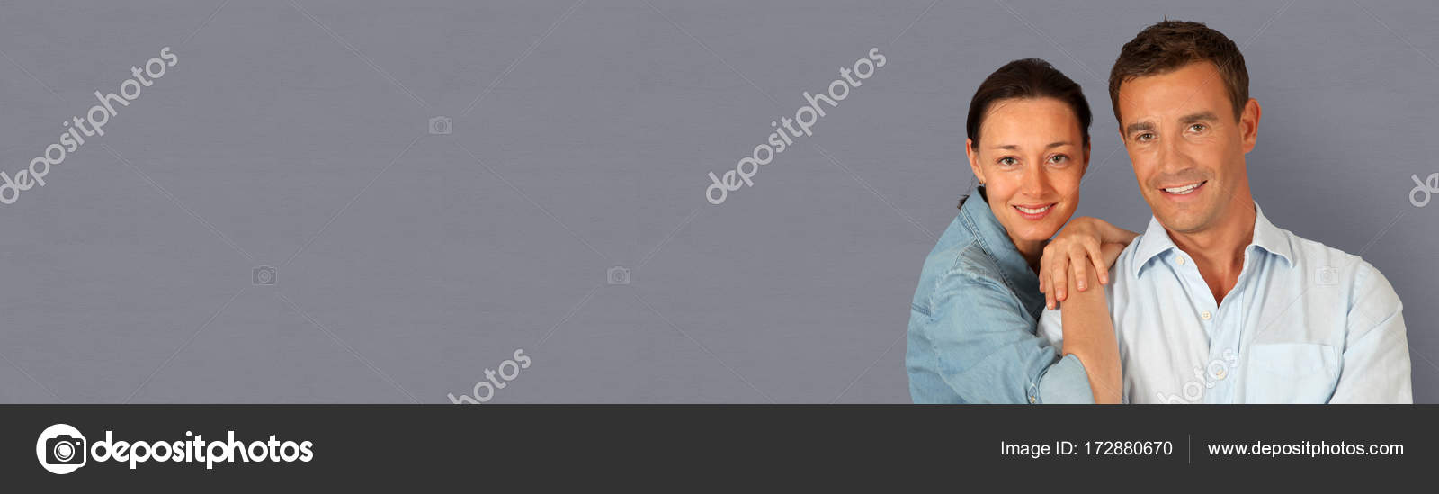 Happy couple standing — Stock Photo © Goodluz #172880670