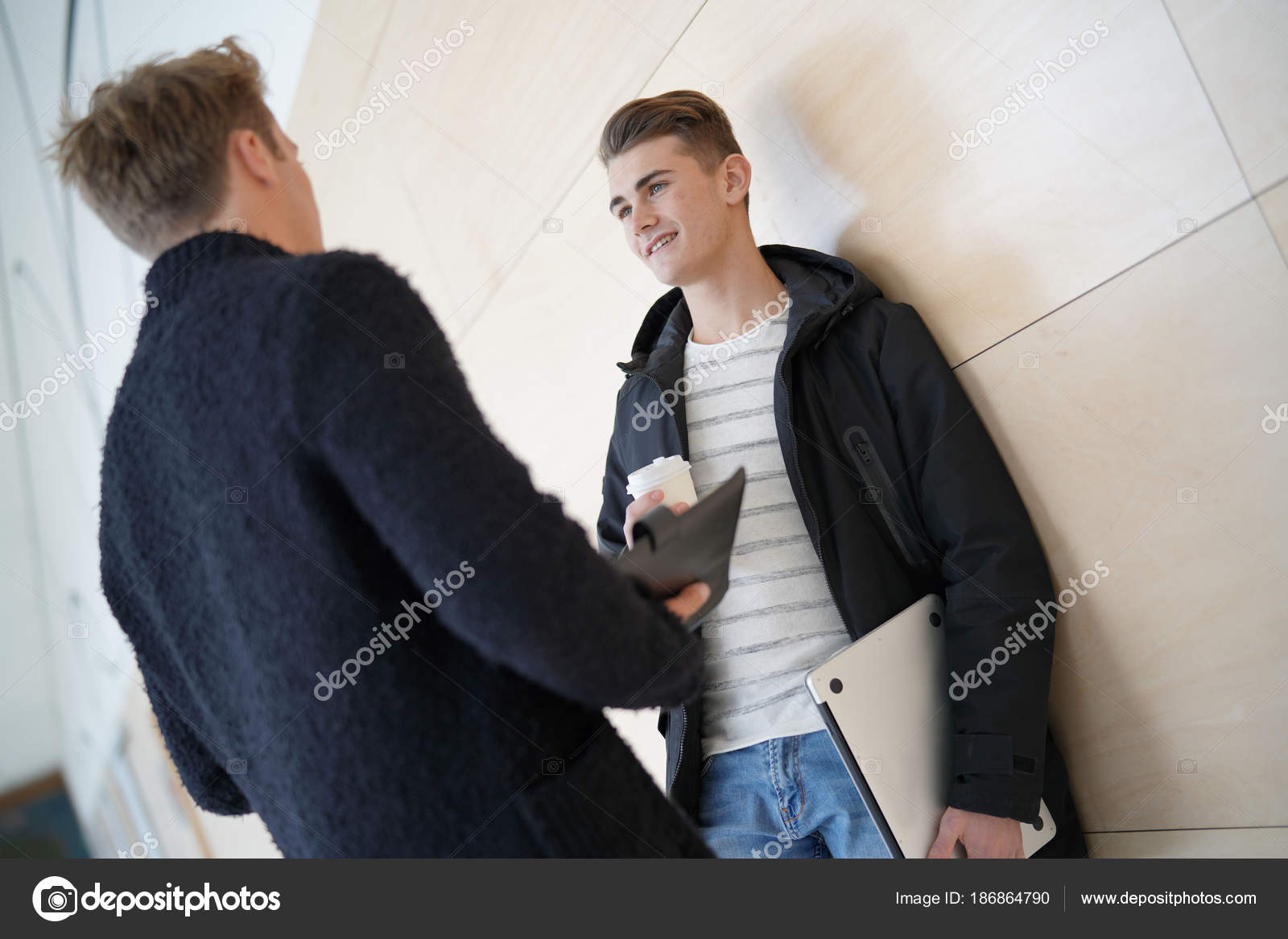 Friends Gathering Talking School Hall Stock Photo by ©Goodluz 186864790