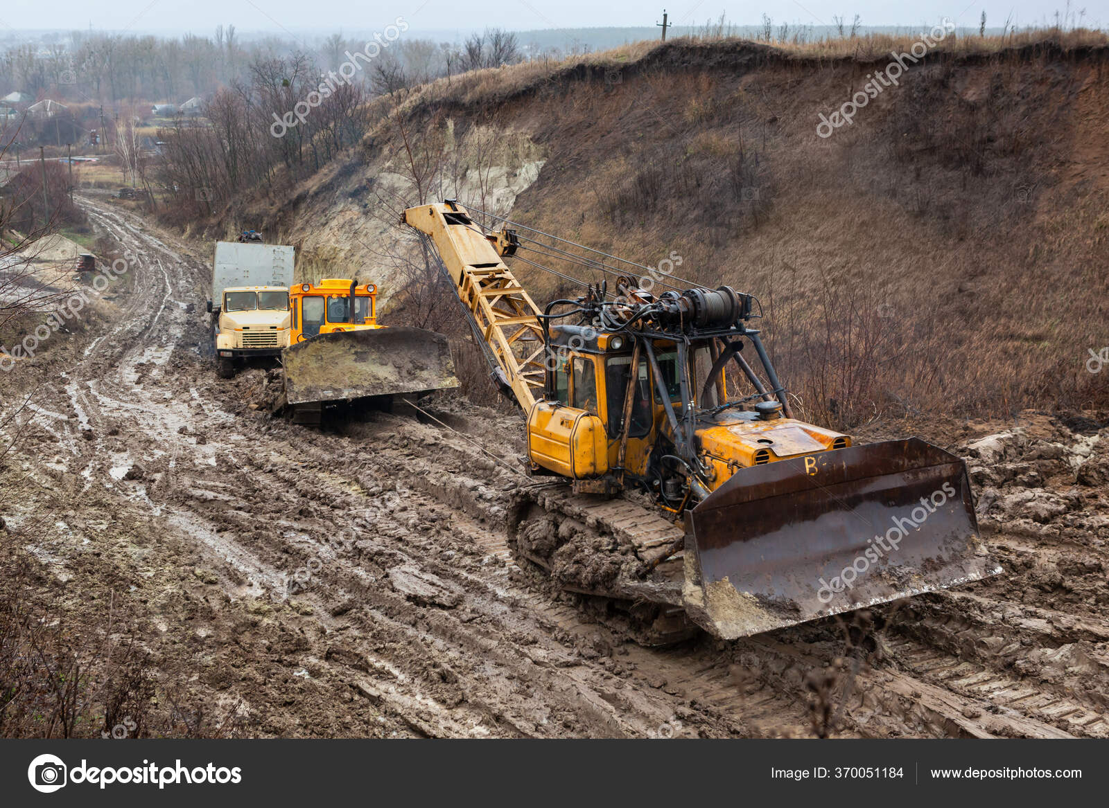 Chain Tracked Bulldozer Mud Road Stock Photo by ©luckyraccoon 370051184