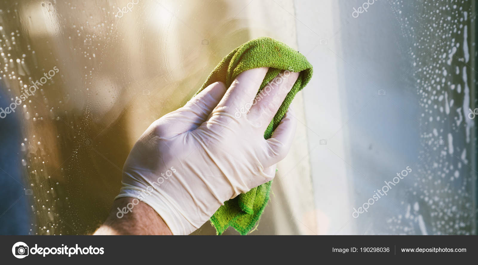 Young Man Using Rag Squeegee While Cleaning Windows Professional Window ...