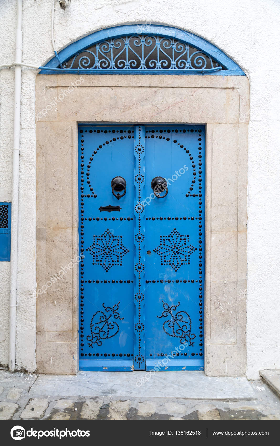 Traditional old Tunisian door — Stock Photo © EnginKorkmaz #136162518
