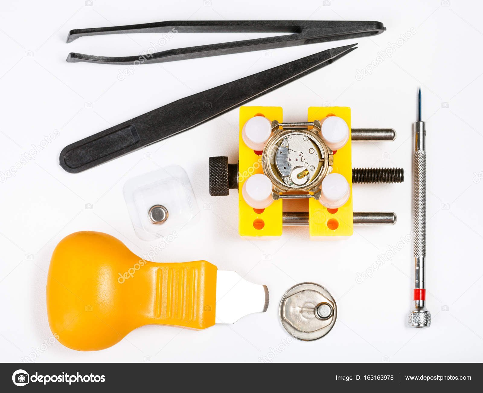 Above view of kit for replacing battery in watch Stock Photo by ...