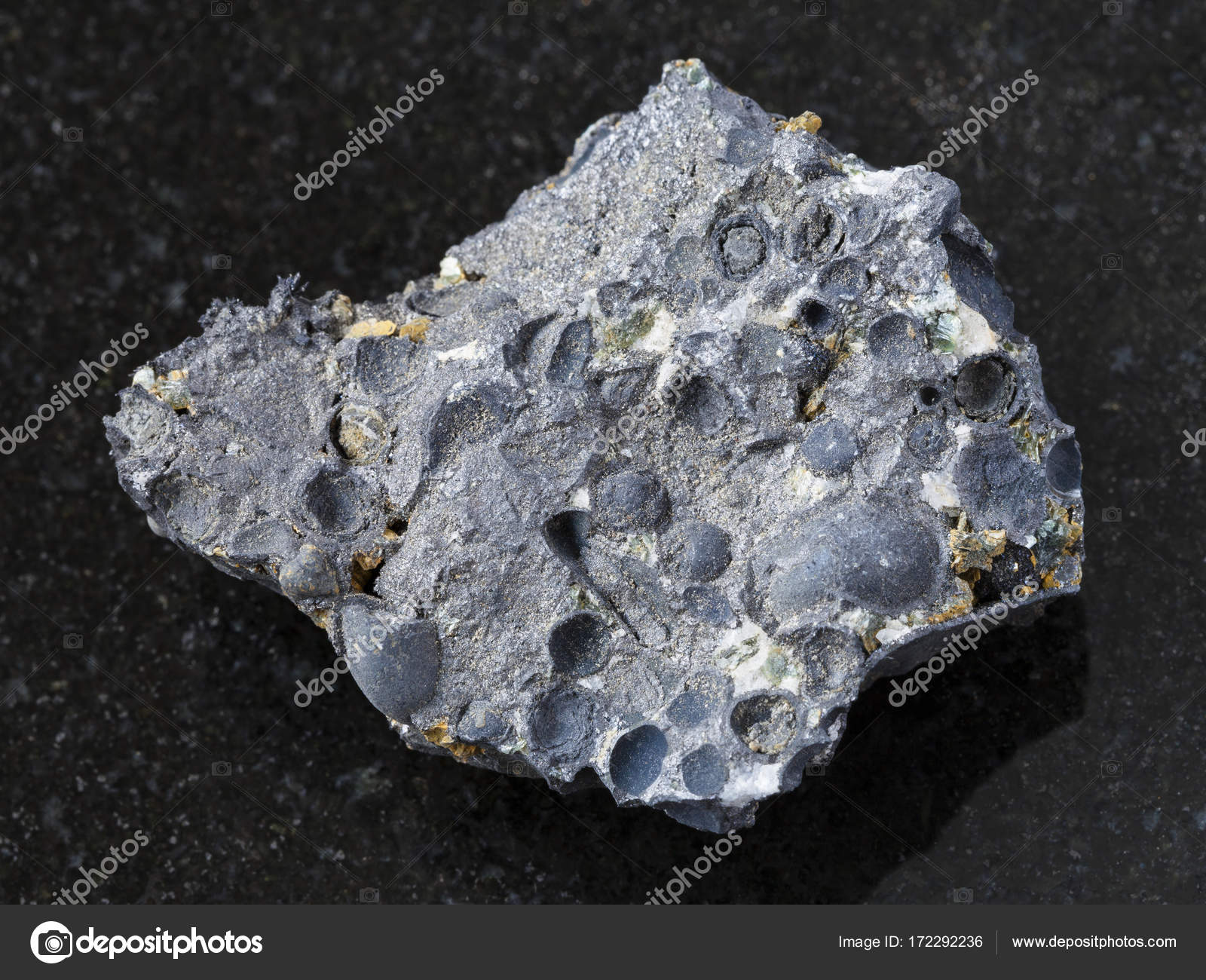 Pisolite stone from magnetite and hematite on dark Stock Photo by ...