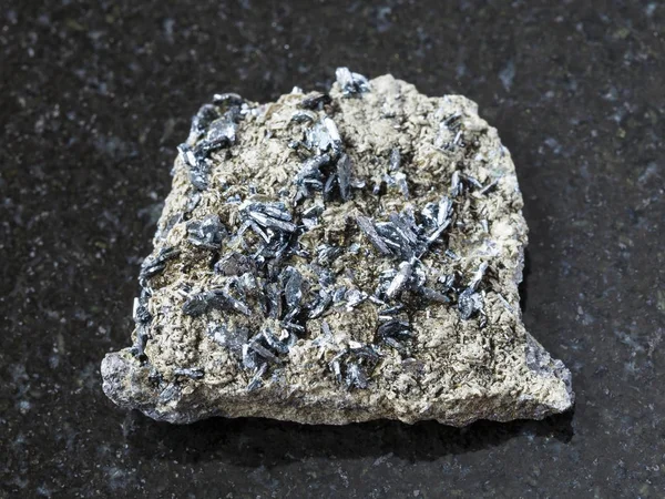 Pisolite stone from magnetite and hematite on dark Stock Photo by ...