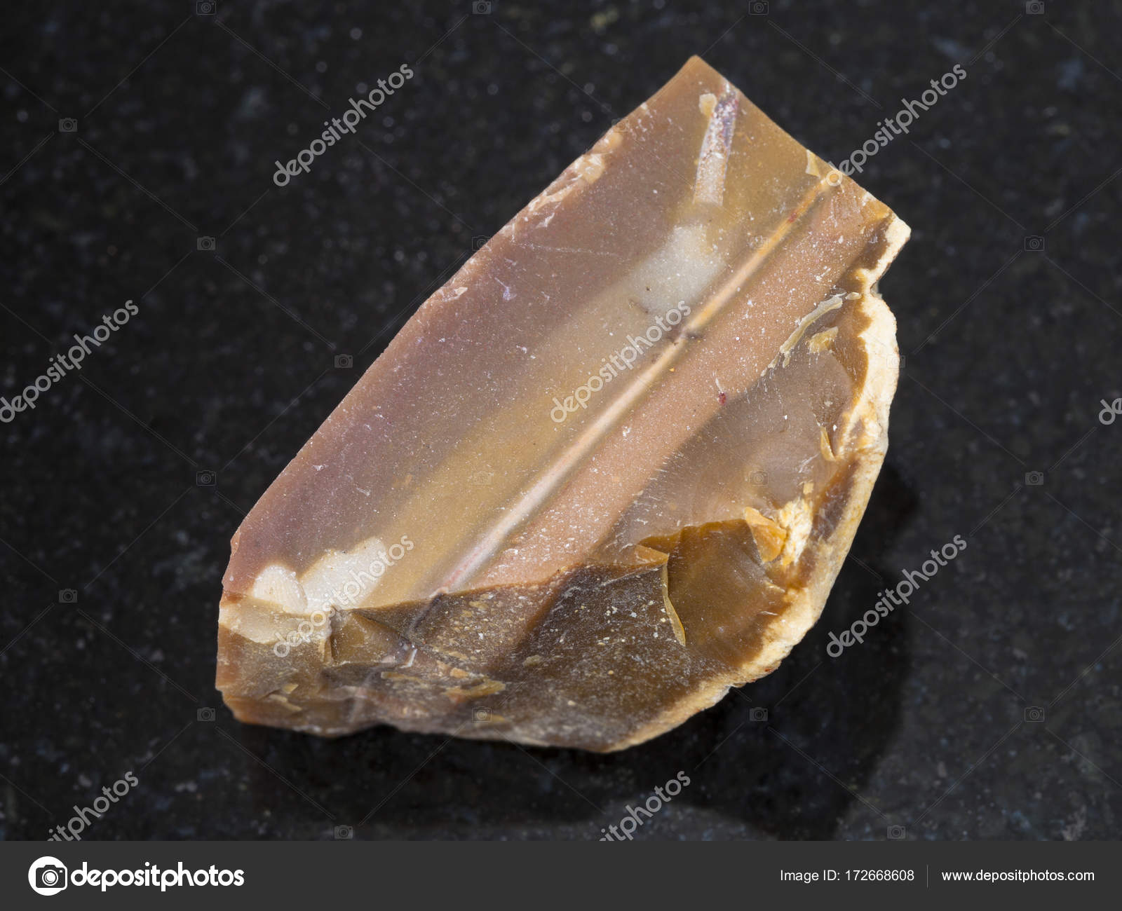 Rough brown Flint stone on dark background — Stock Photo © vvoennyy ...
