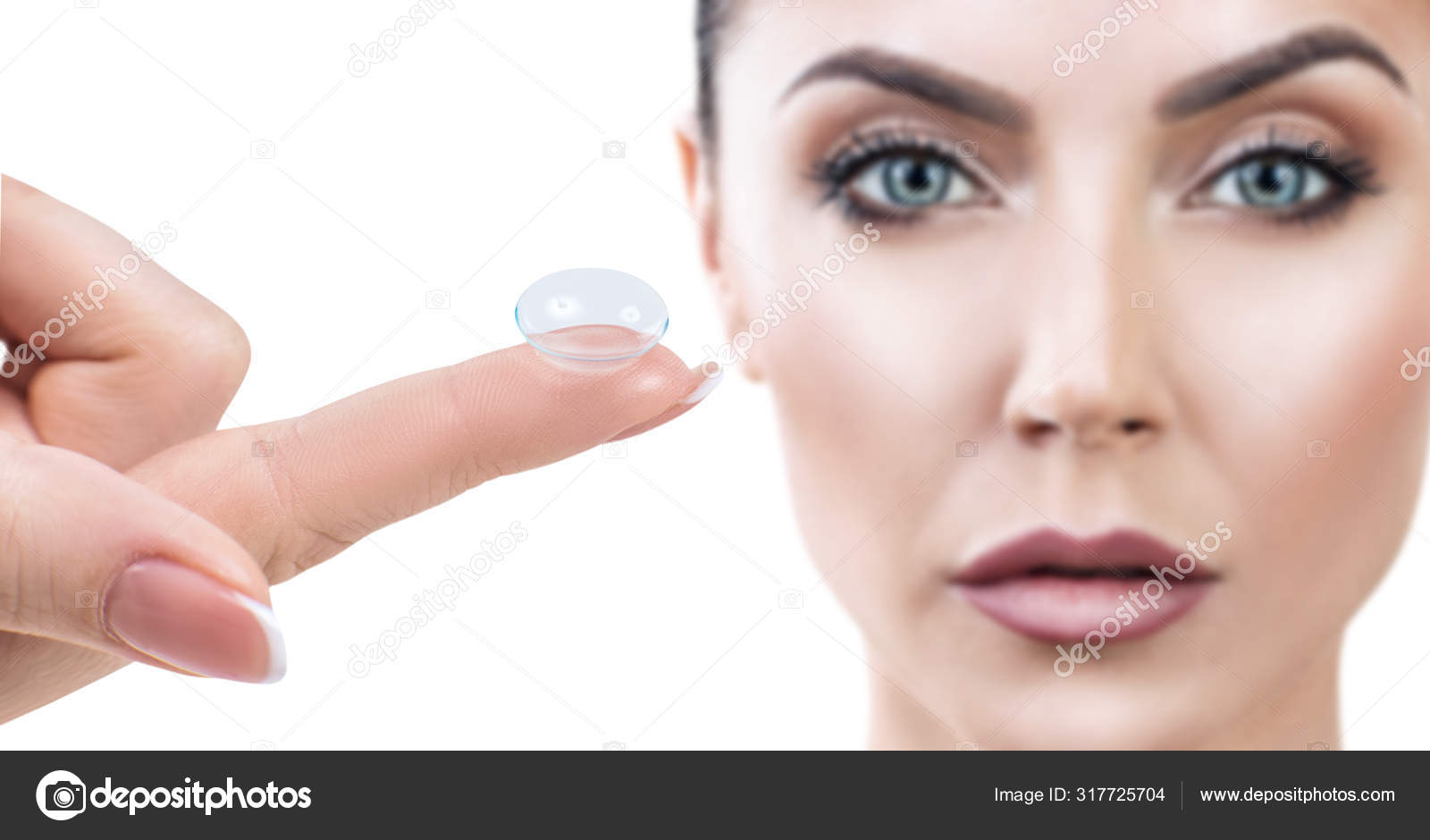 Contact lens on index finger near beautiful female face. Stock Photo by ...