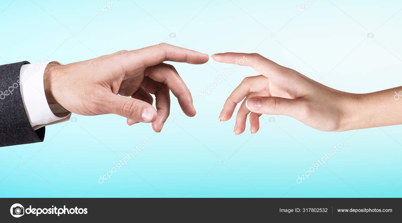 Two hands touching each other. Stock Photo by ©kotin 317802532