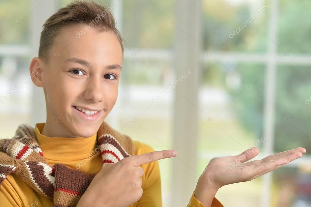 Teen boy pointing — Stock Photo © aletia #129689258