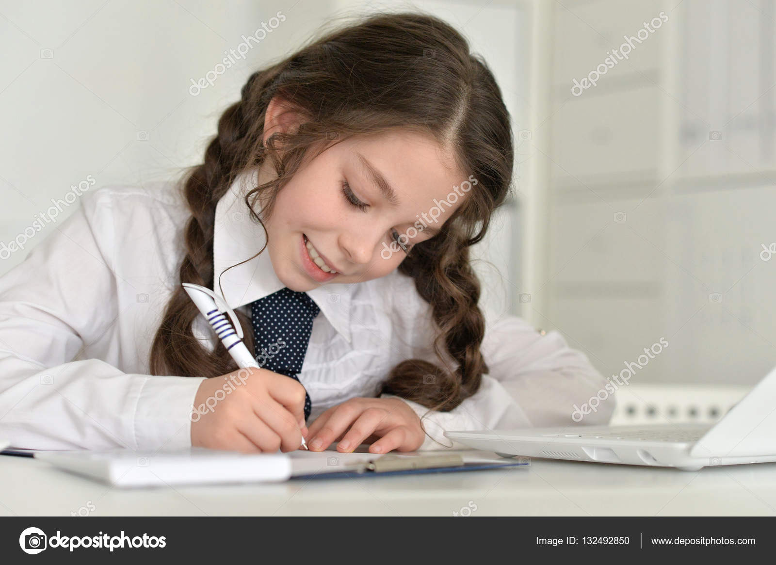 Little girl doing homework — Stock Photo © aletia #132492850