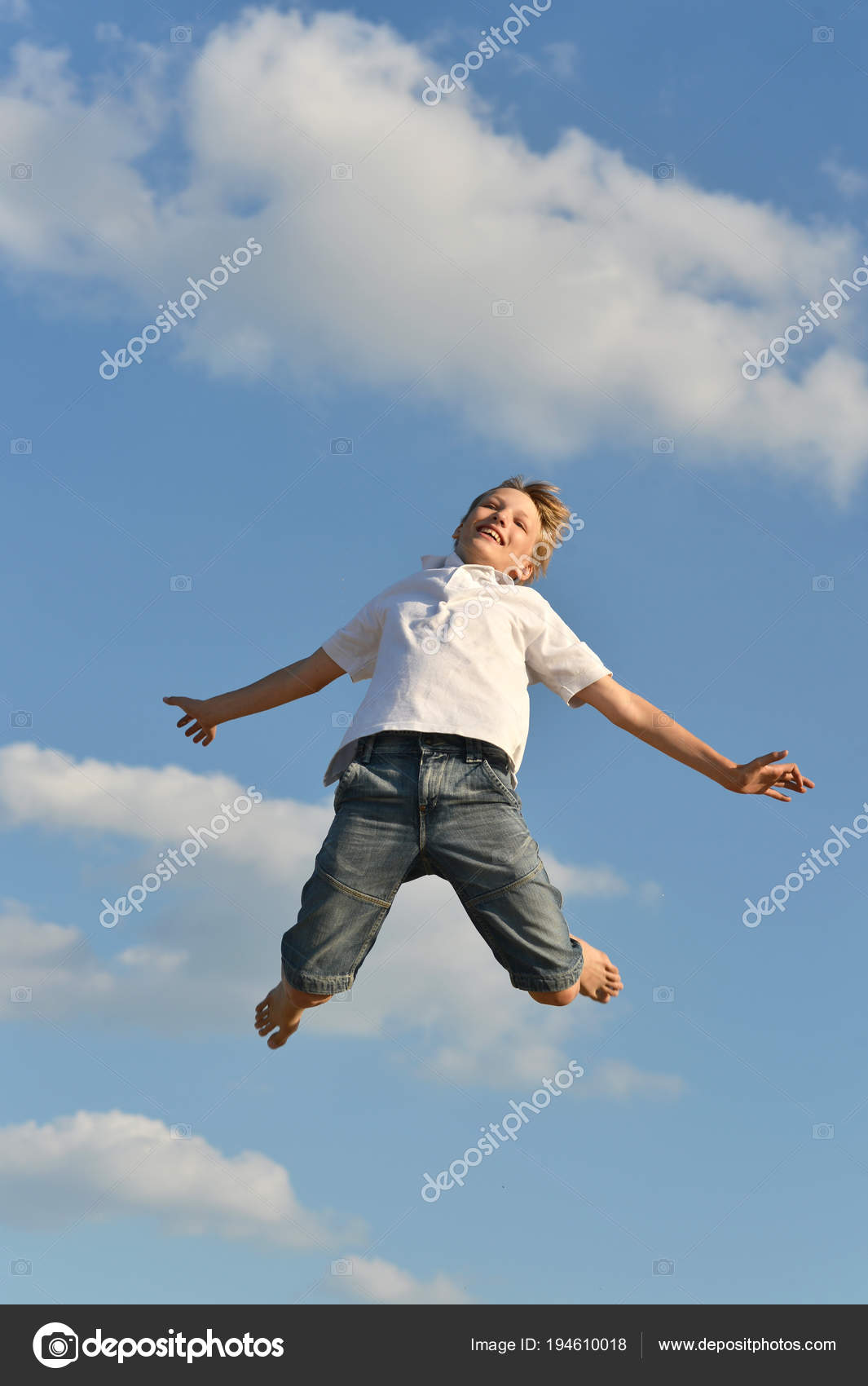 Boy jumping Stock Photo by ©aletia 194610018