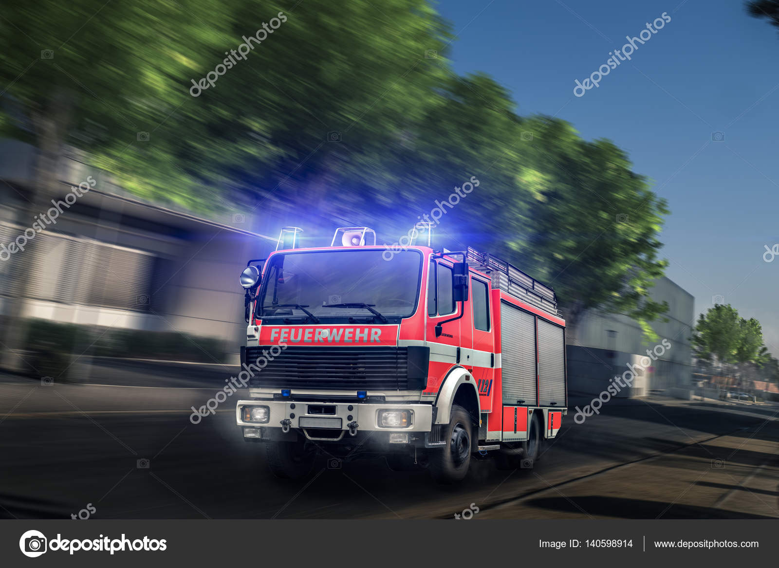 Fire Department driving with blue light — Stock Photo © s.bachstroem ...