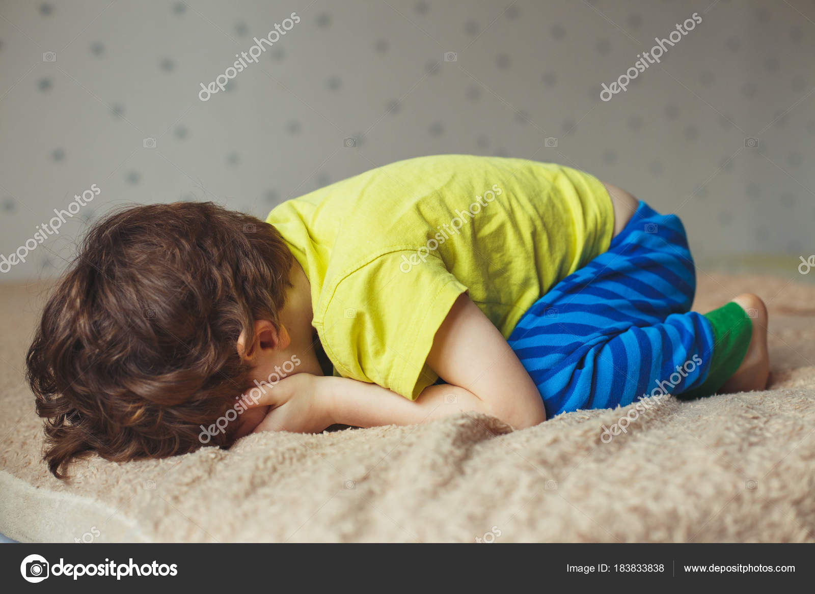 Kid Laying In Bed