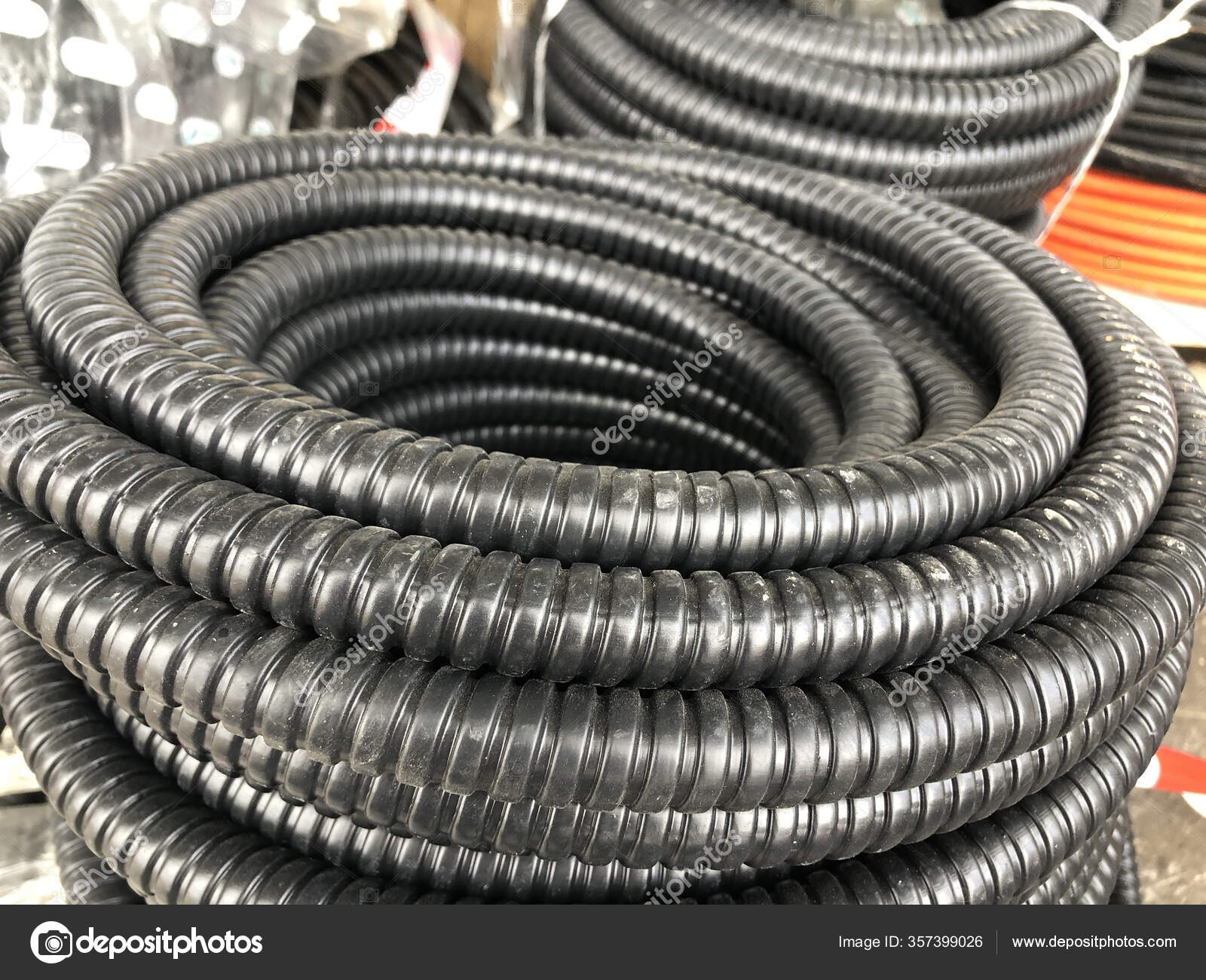 Black Coiled Corrugated Insulation Tube Warehouse Stock Photo by ...