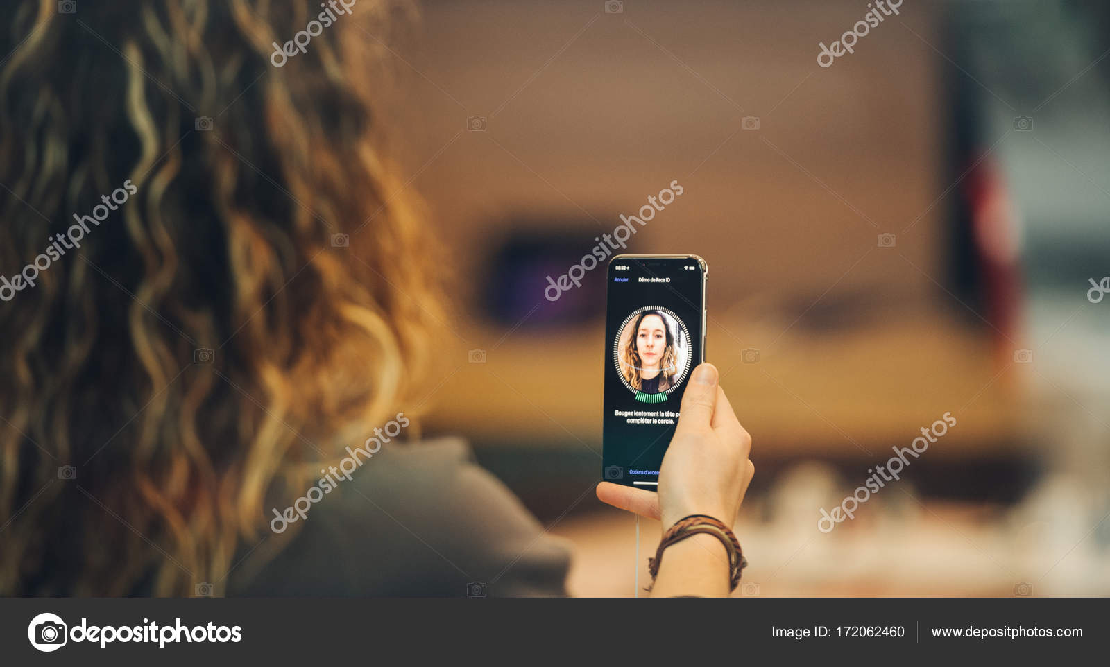 Apple iPhone X goes on sale worldwide woman trying face ID — Stock ...