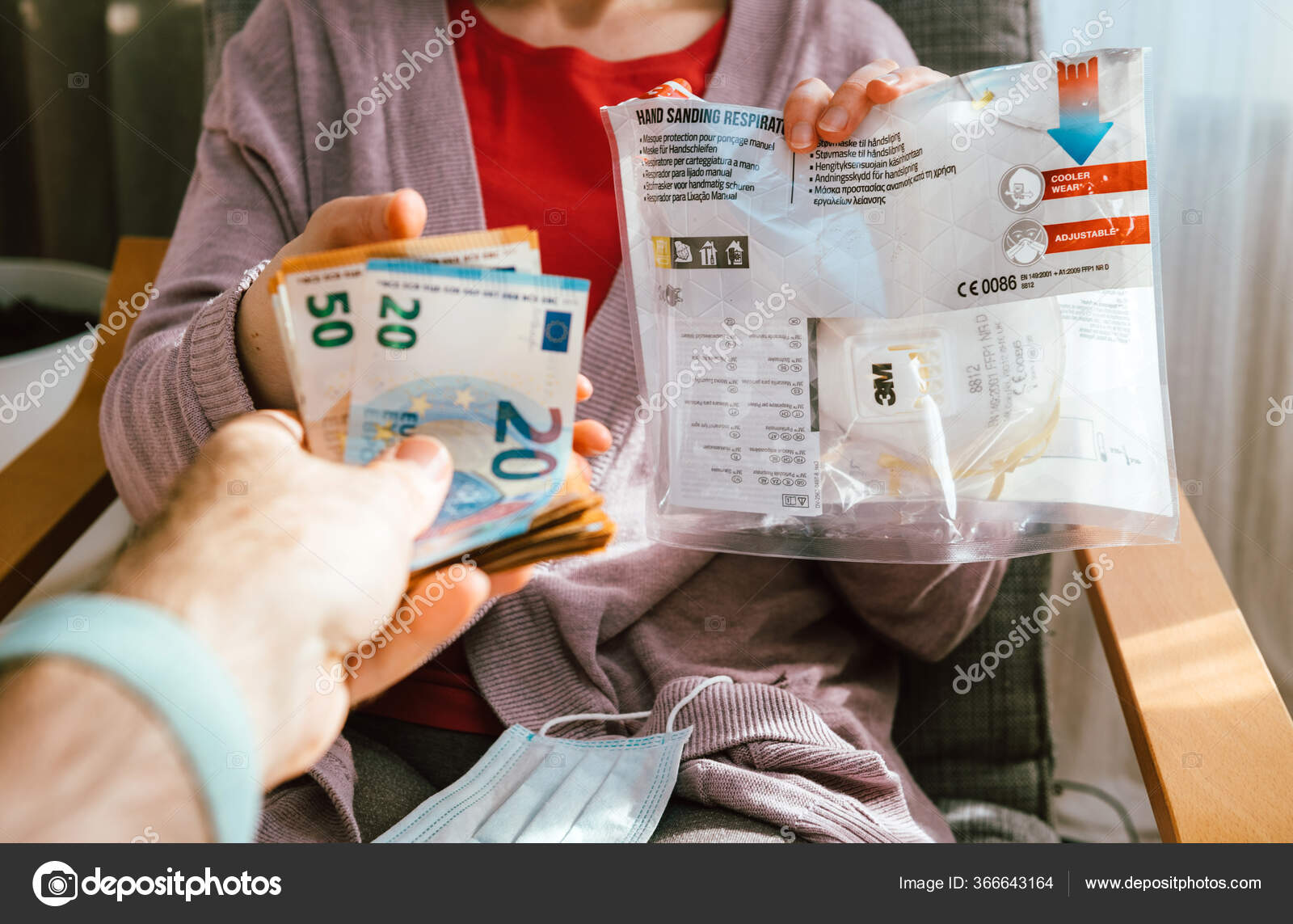 Man offering stack of money banknotes for surgical procedure medical ...