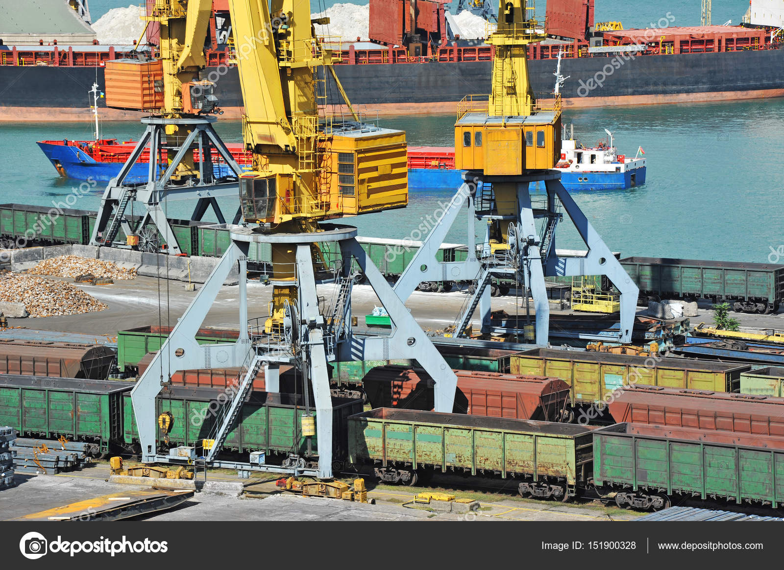 Port cargo crane, train and metal Stock Photo by ©unkas 151900328
