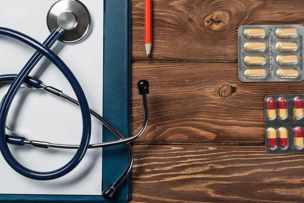 Desk of doctor with medicine things - Stock Image - Everypixel