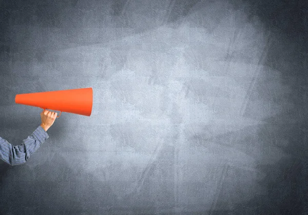 man making announcement in trumpet - Stock Image - Everypixel