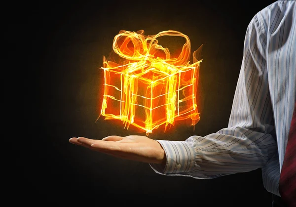 Glowing fire gift box — Stock Photo © Khakimullin #149715490