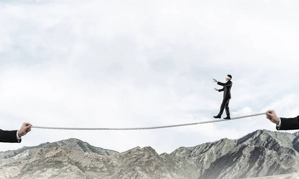 Businessman walking blindfolded - Stock Image - Everypixel