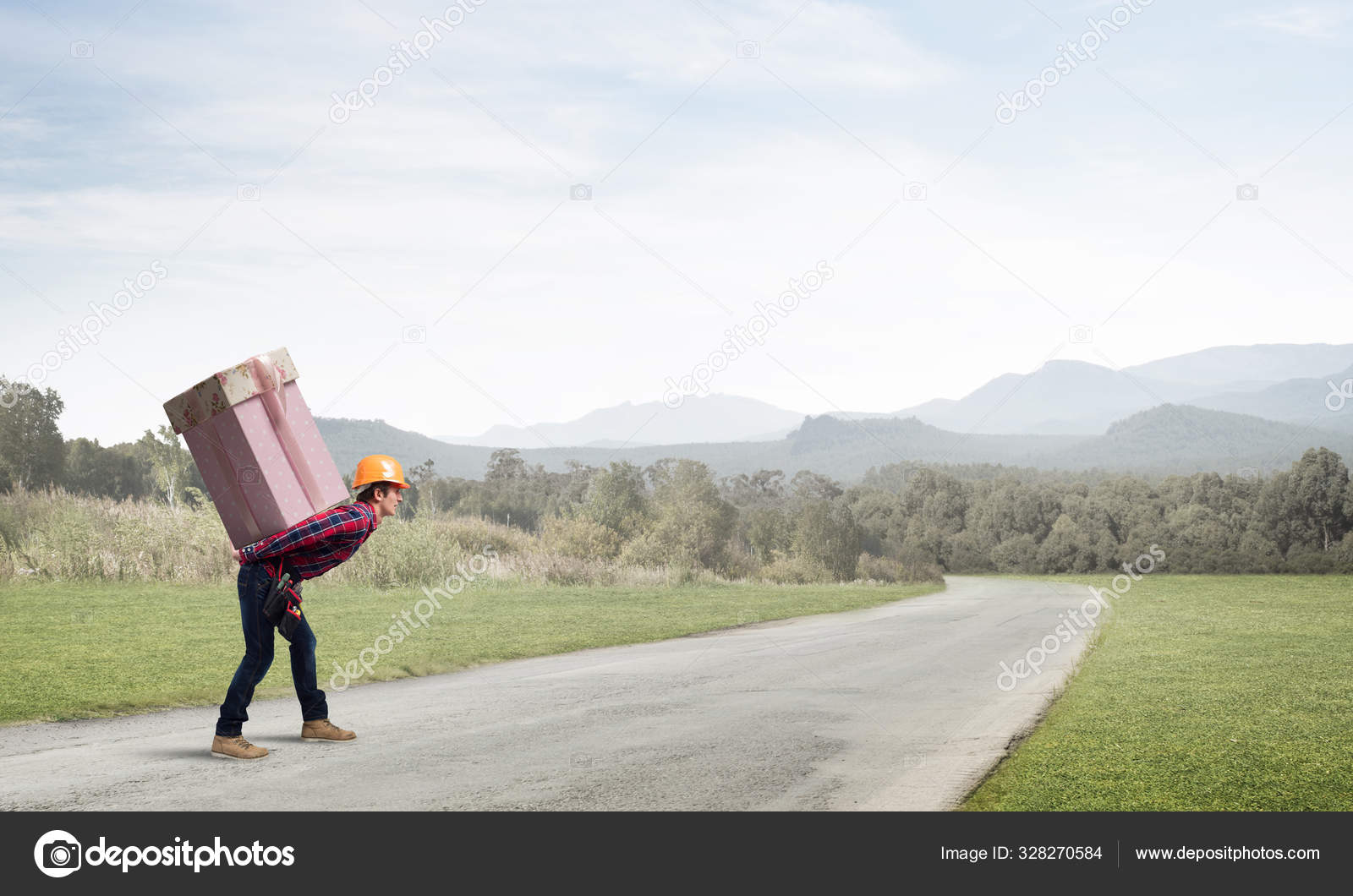Man Carrying His Back Large Box Stock Photo by ©Khakimullin 328270584