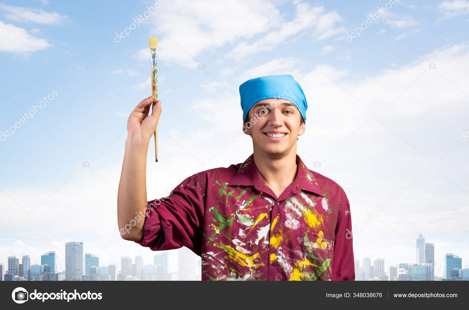 Smiling Young Painter Artist Pointing Upwards Paintbrush Hand Portrait ...