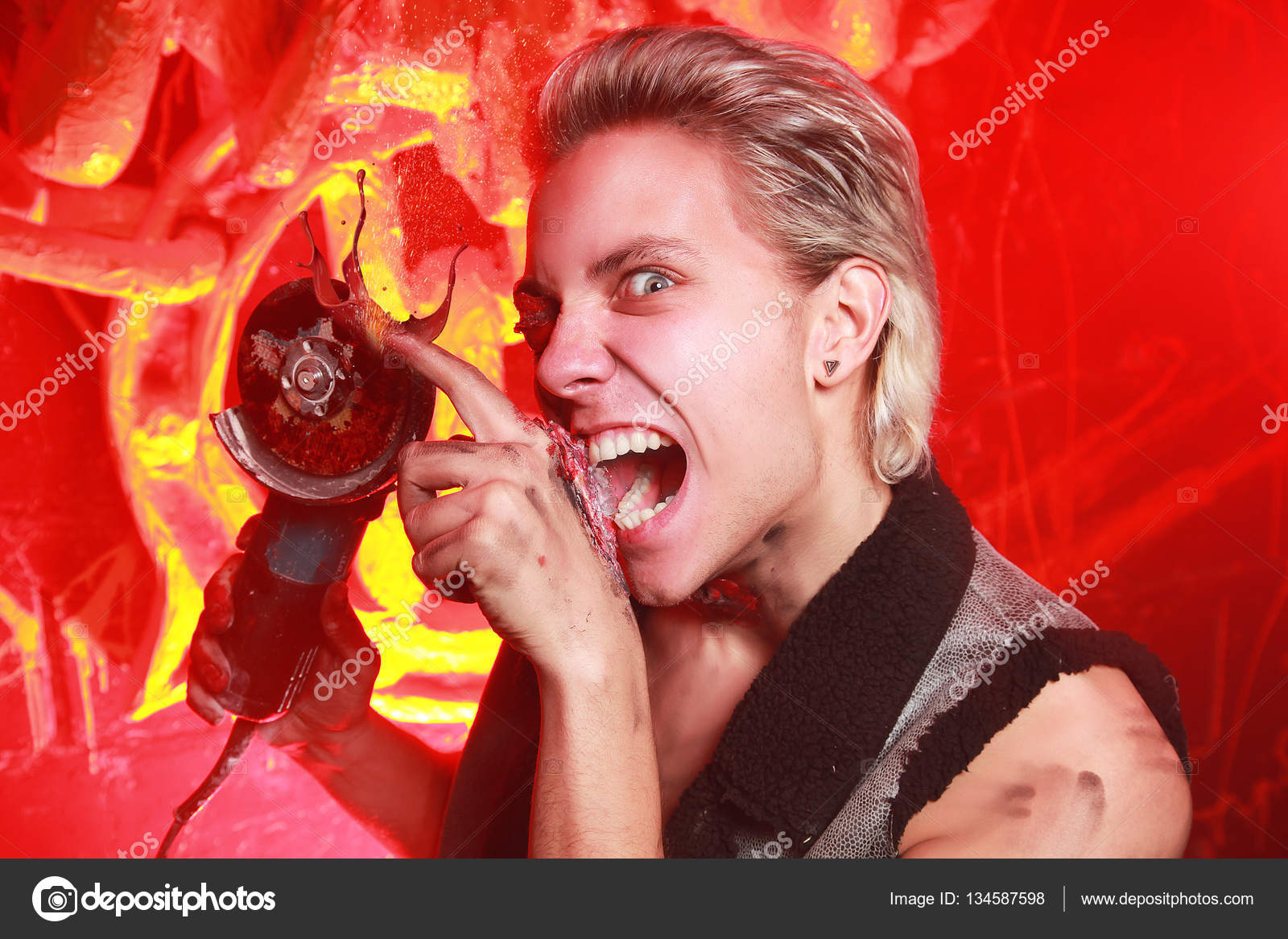 PainFul Crazy Boy With Grinder — Stock Photo © agnadevi #134587598