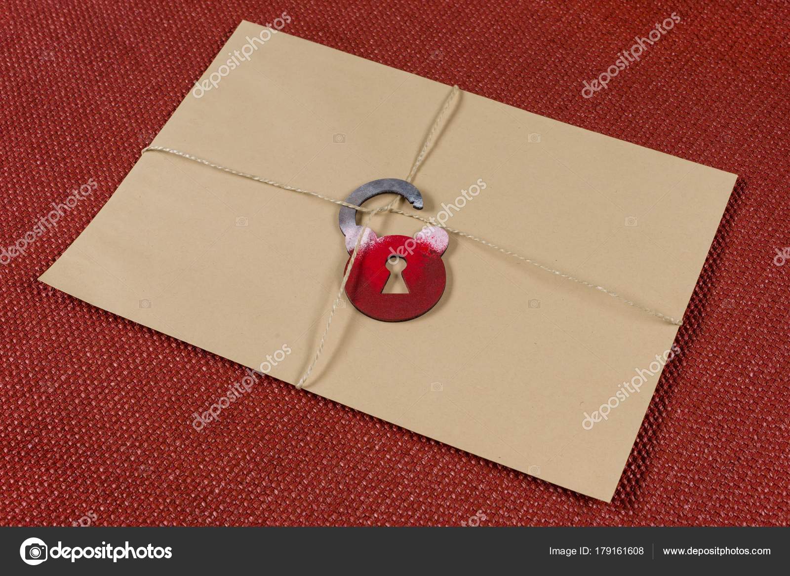 A secret envelope, a parcel bound with a rope, with a symbolic lock ...