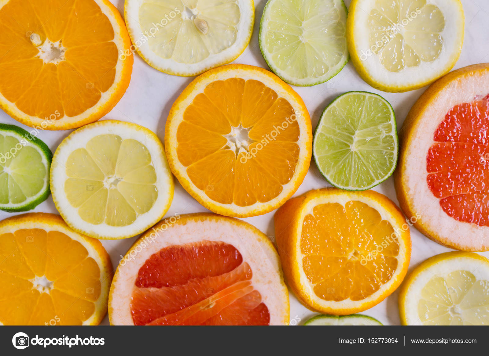 Mixed citrus fruit background Stock Photo by ©CokaPoka 152773094