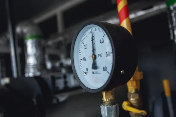 Temperature gauge connect with pipeline background. Industrial water ...