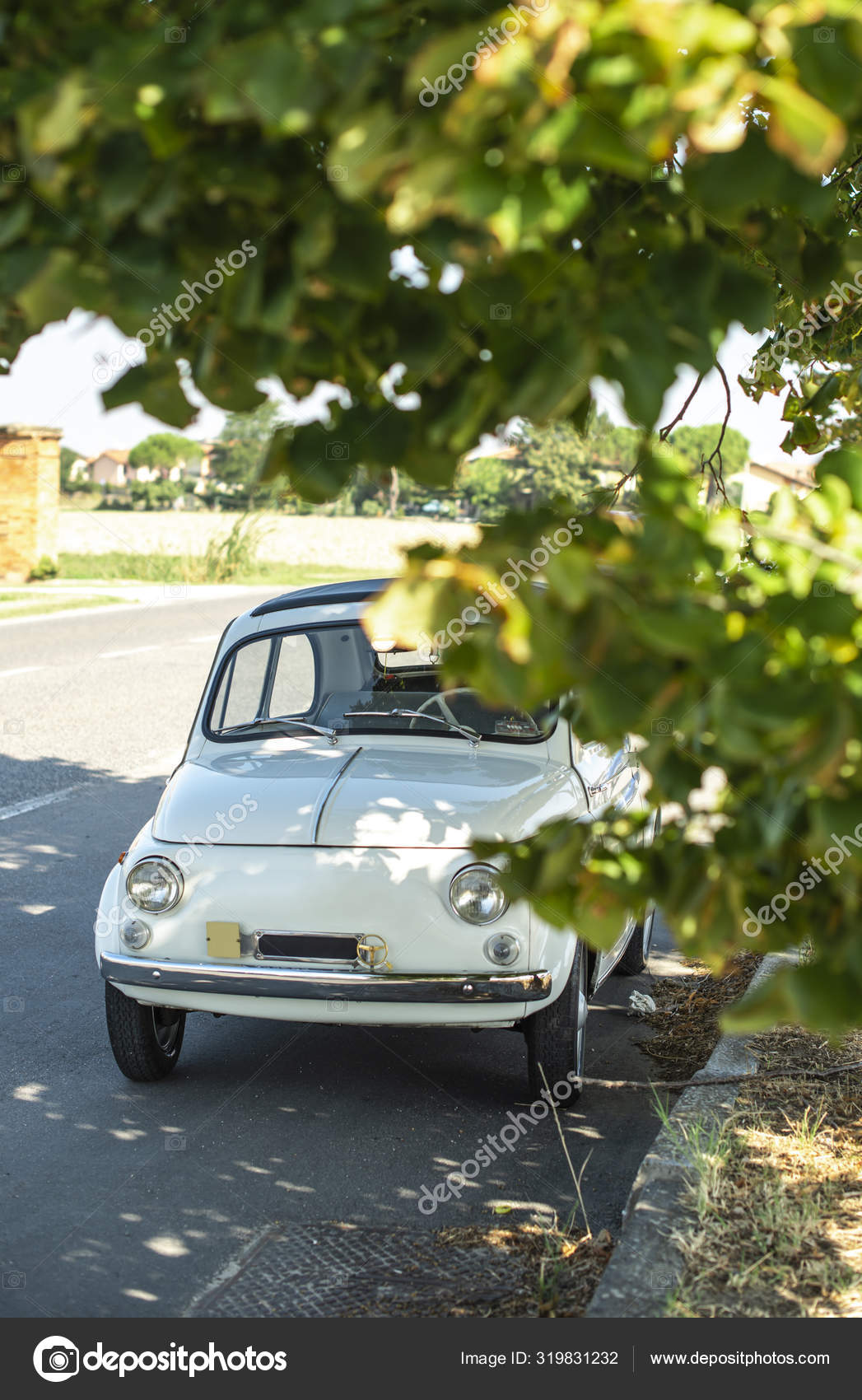 White small vintage car on the street. No people. — Stock Photo ...