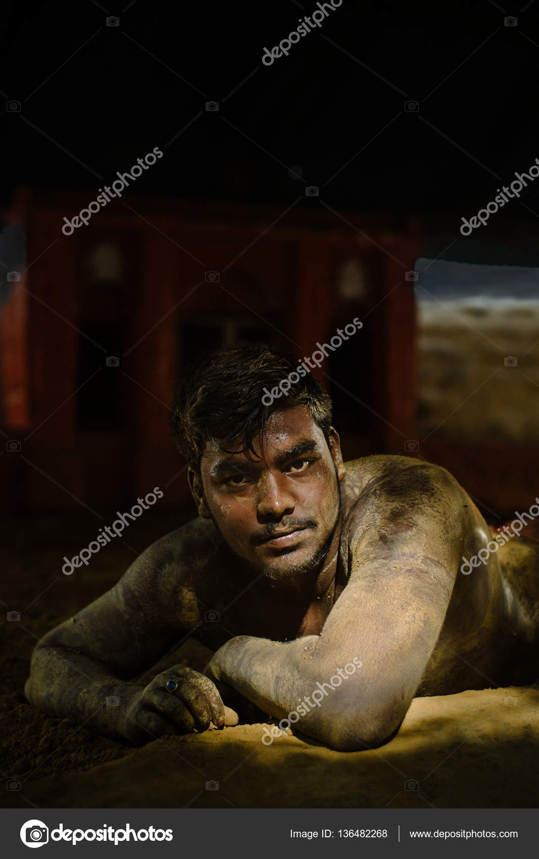 Indian mud wrestler lying on sand — Stock Editorial Photo © costasd68 ...