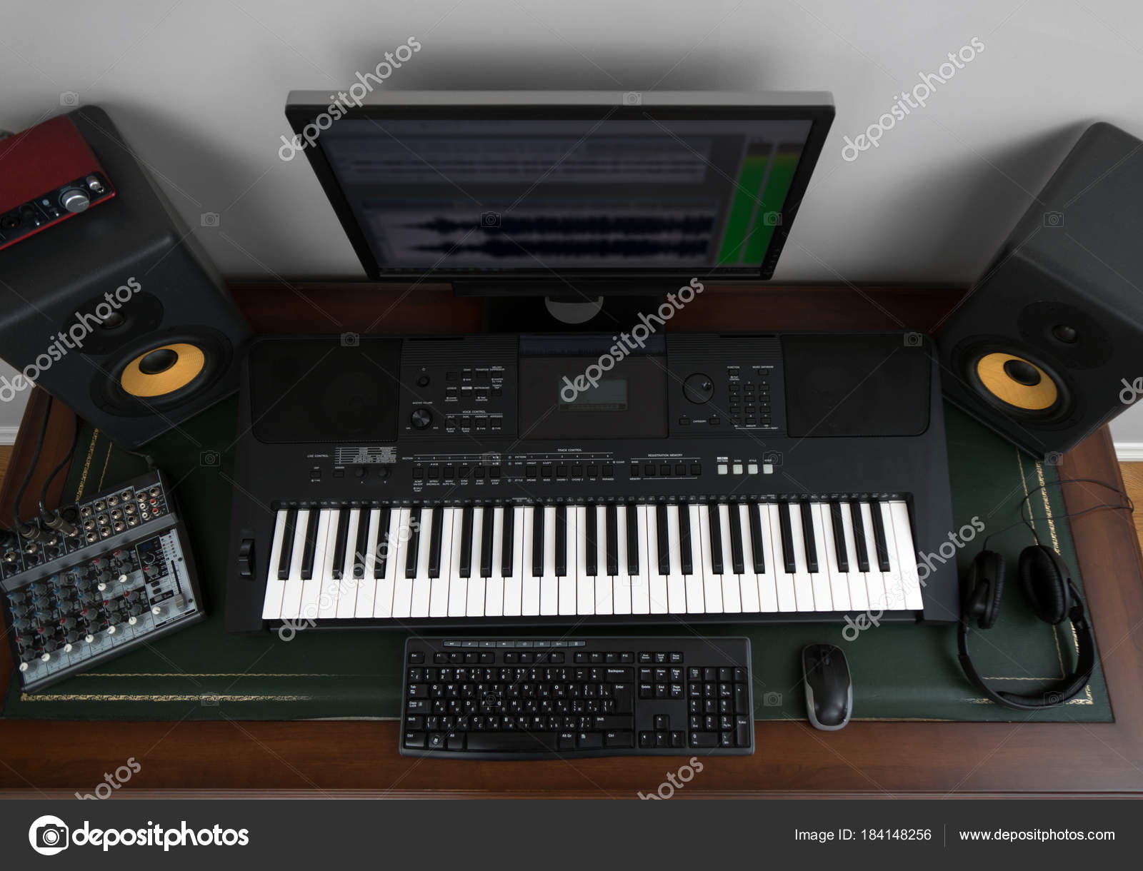 Home recording studio with professional monitors and midi keyboard. Top ...