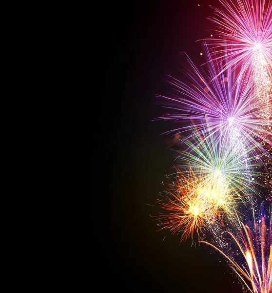 Fireworks explosions on black background Stock Photo by ©jag_cz 159071350