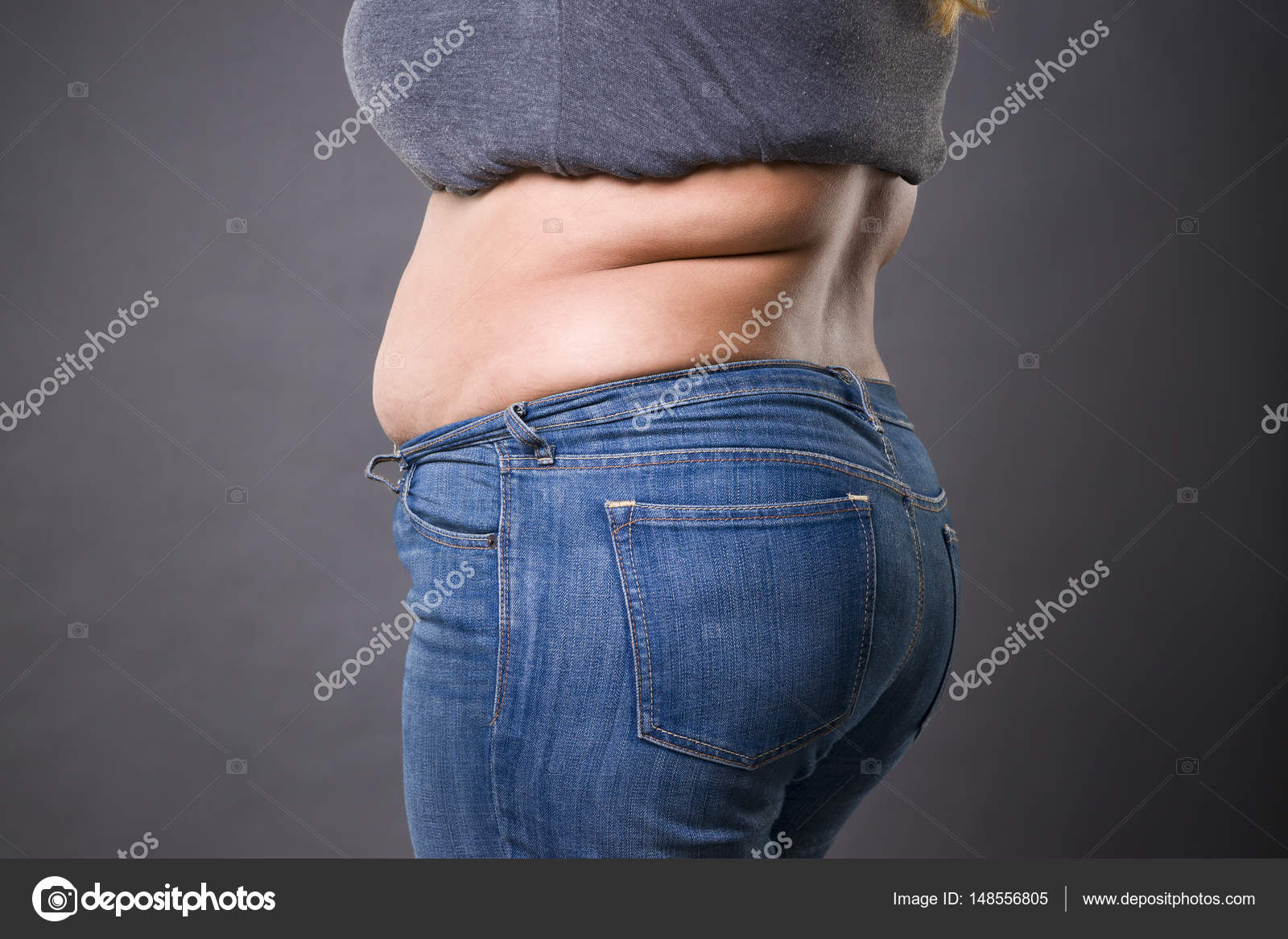 Woman With Fat Abdomen In Blue Jeans Overweight Female Stomach