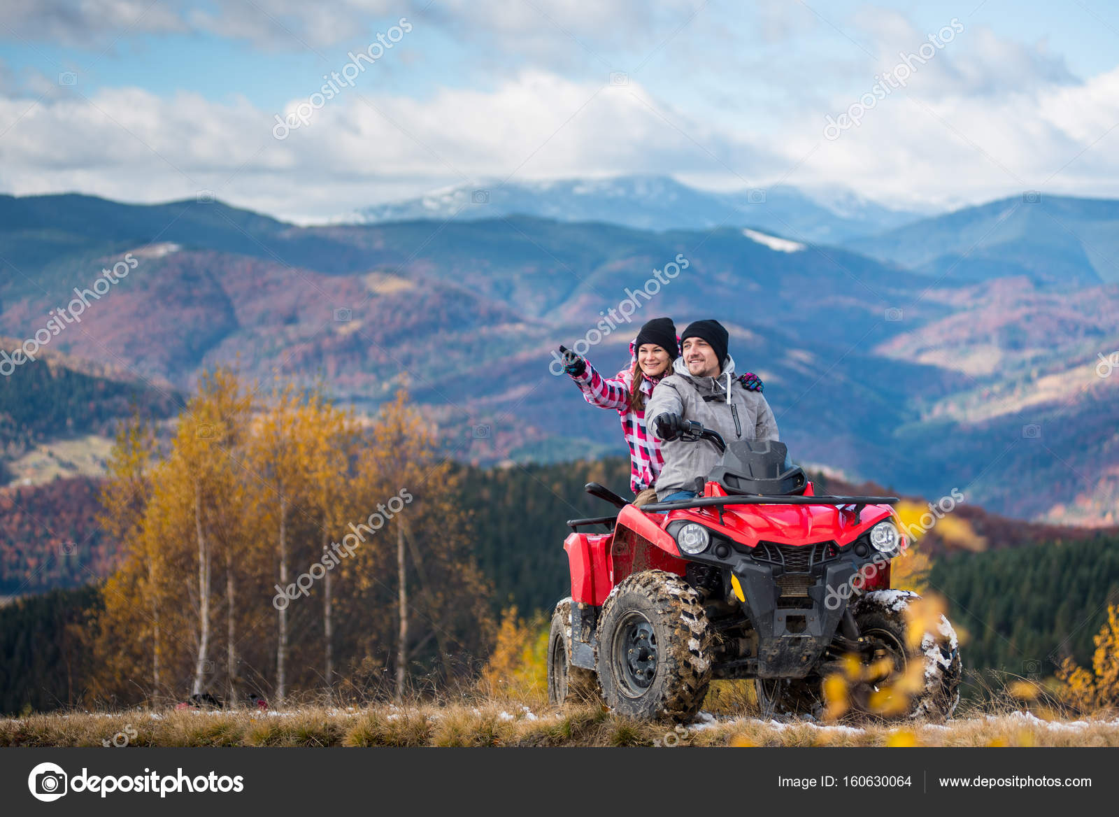 Couple on four-wheeler ATV in mountains Stock Photo by ©anatoliy_gleb ...