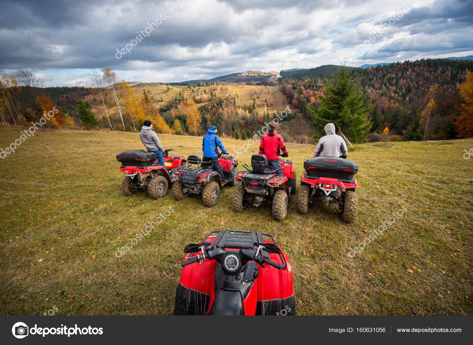 People riding a quad bikes on hill. Stock Photo by ©anatoliy_gleb 160631056