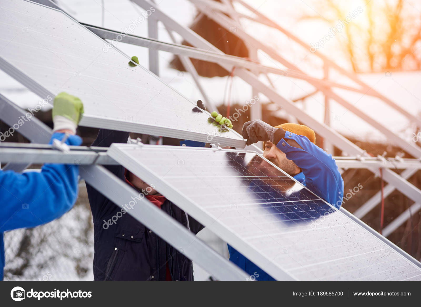 Workers installing solar panels Stock Photo by ©anatoliy_gleb 189585700