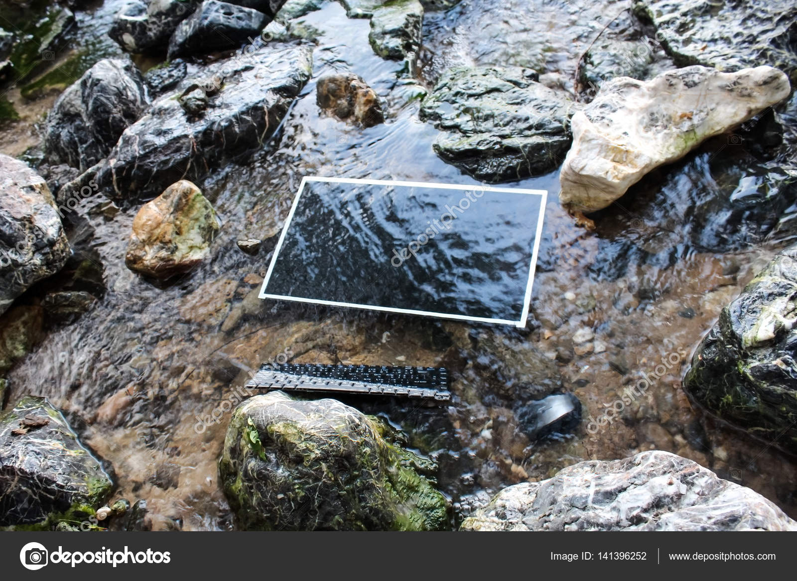 The computer under the surface of the water in a waterfall. — Stock ...