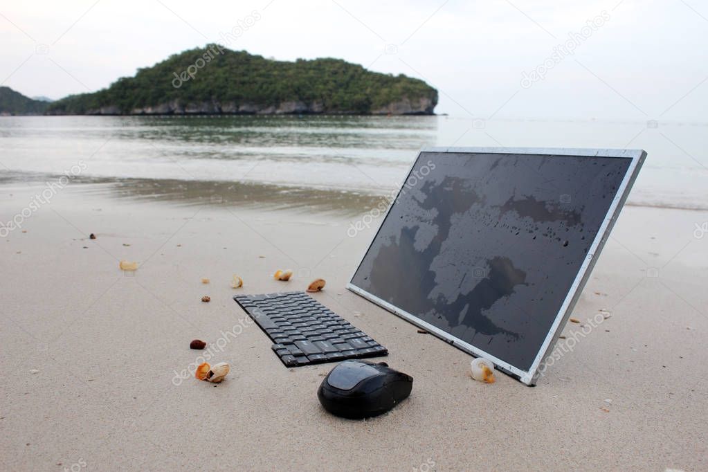The computer on the beach. — Stock Photo © gonnjdi.gmail.com #141396230