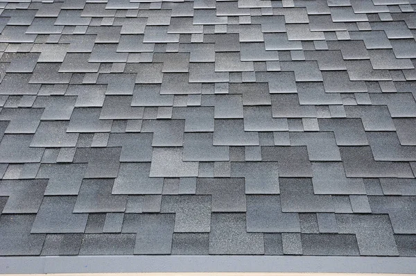 Bitumen tile roof. Roof Shingles - Roofing. Close up view on Asphalt ...