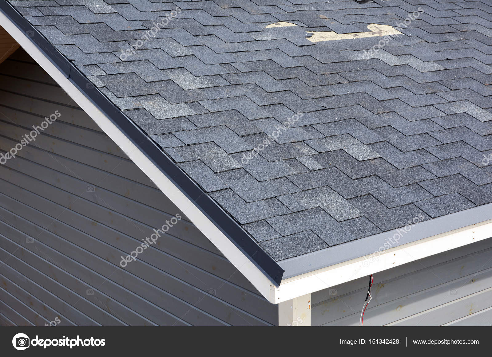 A close up view of shingles a roof damage. Roof Shingles - Roofing ...