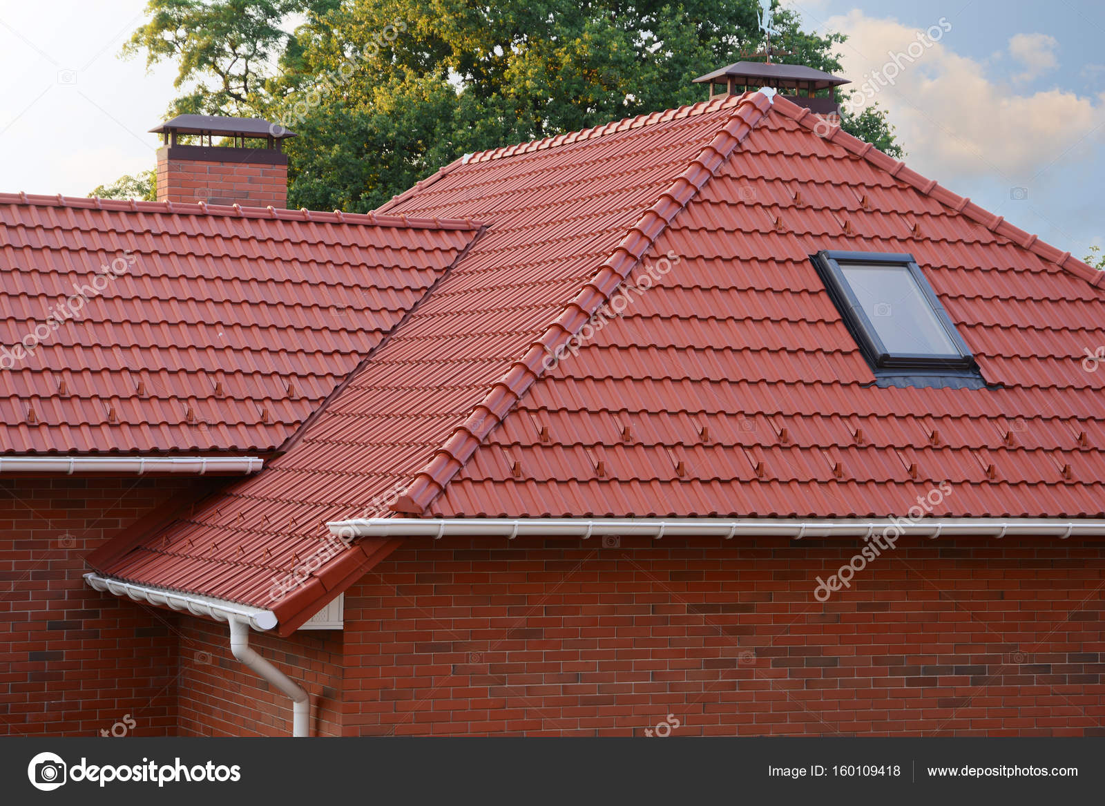 New Red Shingles Roof with Skylights Windows and Rain Gutter. New brick ...