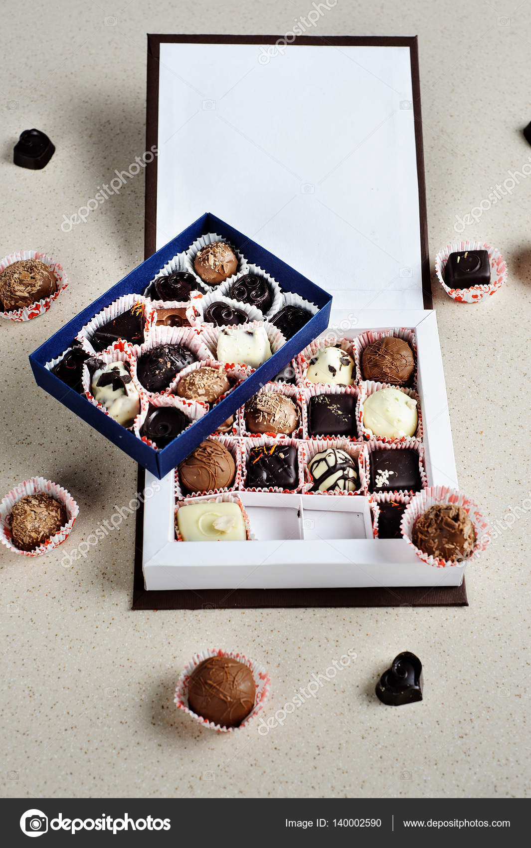 A box of chocolates Stock Photo by ©surenderphoto 140002590