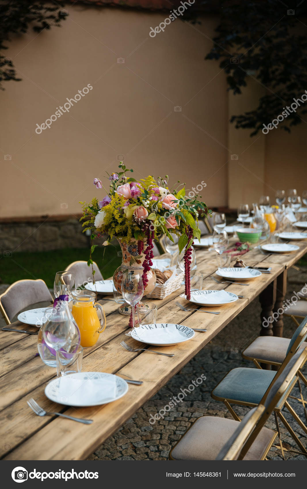 Set table before lunch Stock Photo by ©peterkarasev 145648361