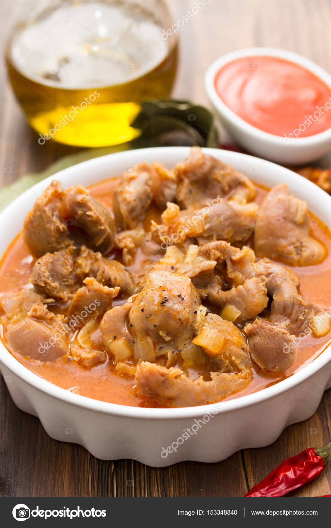 Boiled chicken gizzards with vegetables on white bowl Stock Photo by ...